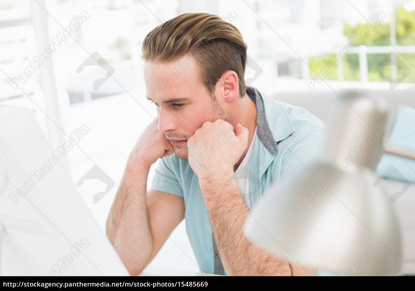 Focused Businessman Working With Computer Lizenzfreies Bild